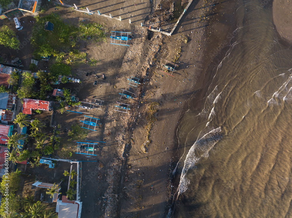 Top aerial view of a beach and fishing village in Naic, Cavite ...