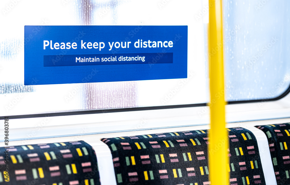 Social distancing signs in the metro train of London, England Stock ...