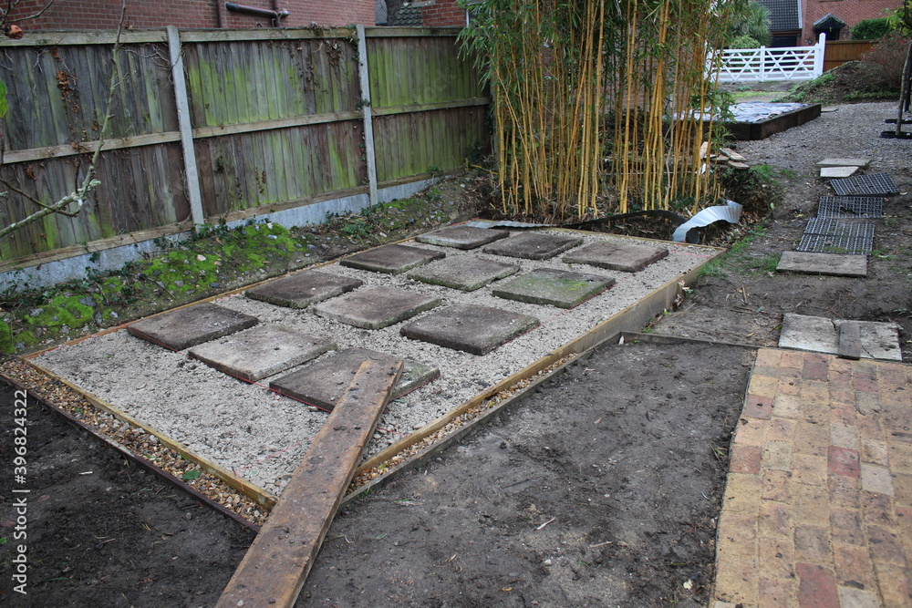 Close up of shed base construction of wood edging prepared hardcore ...