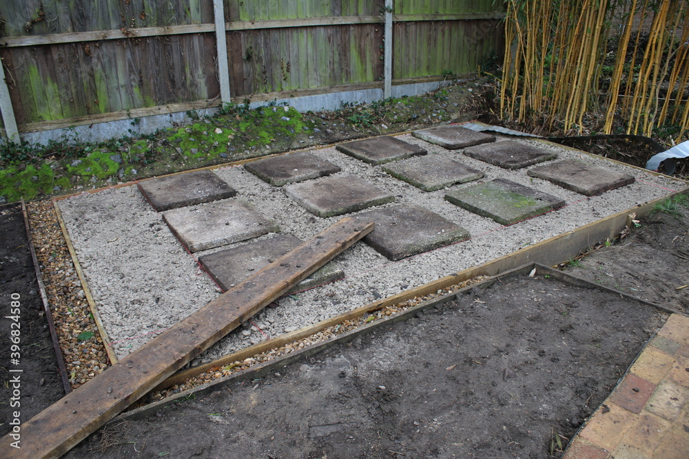 Close up of shed base construction of wood edging prepared hardcore ...
