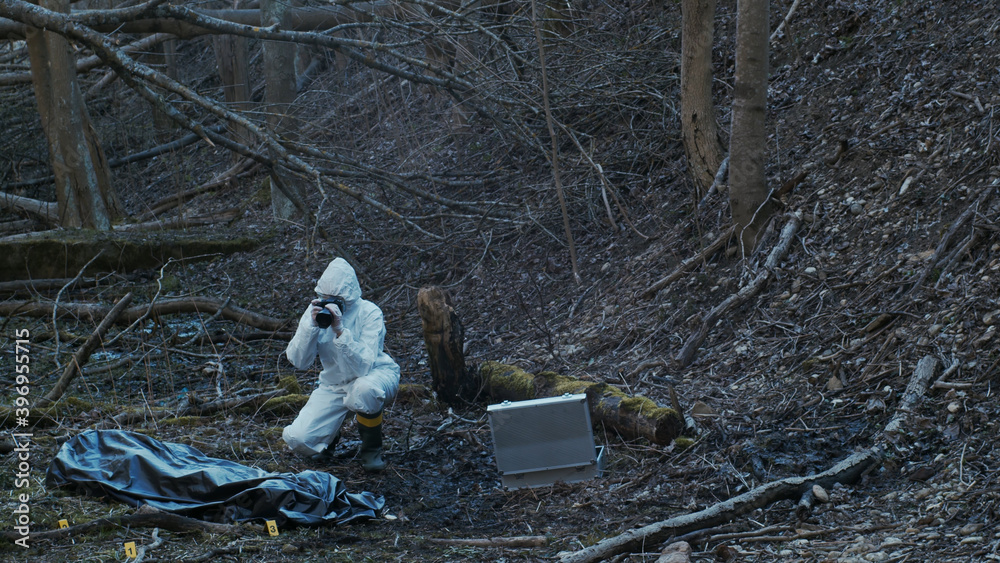 Detectives are collecting evidence in a crime scene. Forensic ...