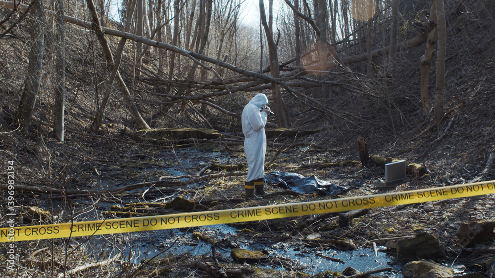 Detectives are collecting evidence in a crime scene. Forensic ...