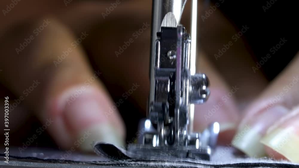 close up view of African American black hand with long nails using a ...
