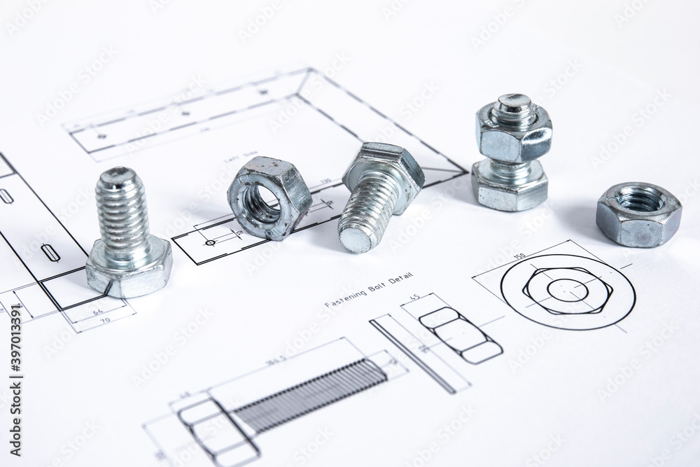 Technical drawing with bolts and nuts. Close-up picture taken in studio ...