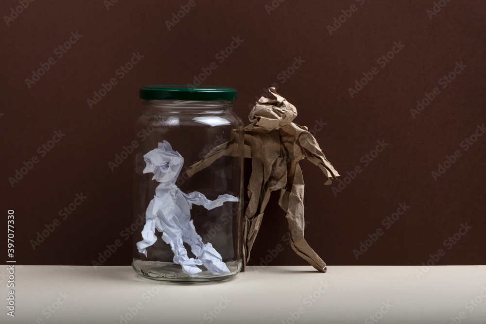 Human figures made from crumpled paper. Isolation concept. Stock Photo ...