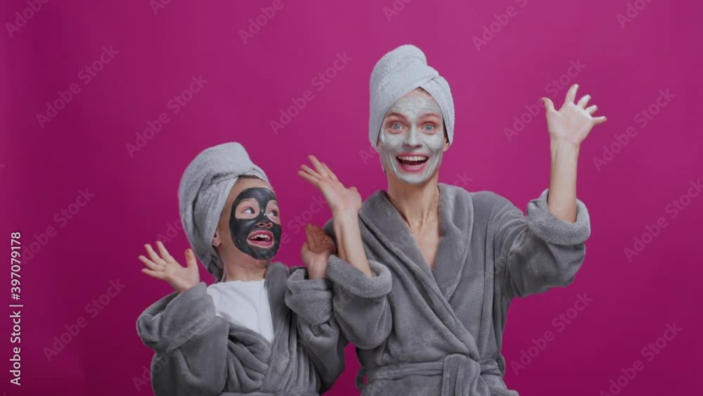 Funny scared mom and daughter wearing clay masks screaming when seeing ...