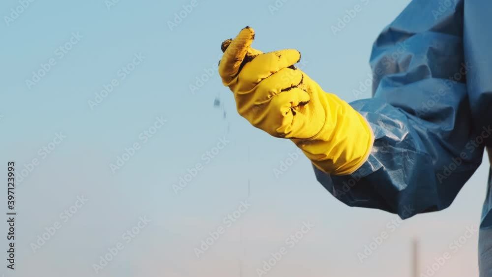 Video Stock Closeup of unrecognizable hand in yellow rubber gloves ...
