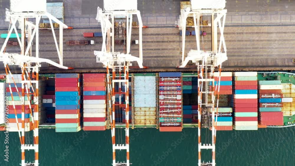 Container ship loading and unloading in deep sea port, Aerial view of ...
