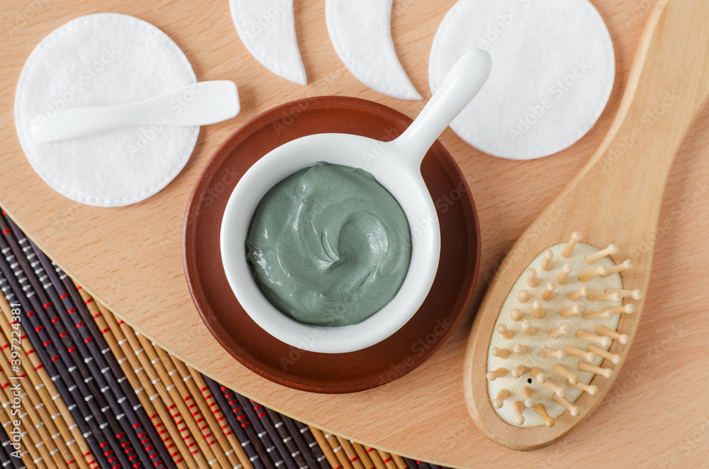 Gray (green) bentonite clay in the bowl. Clay texture close up. Diy ...