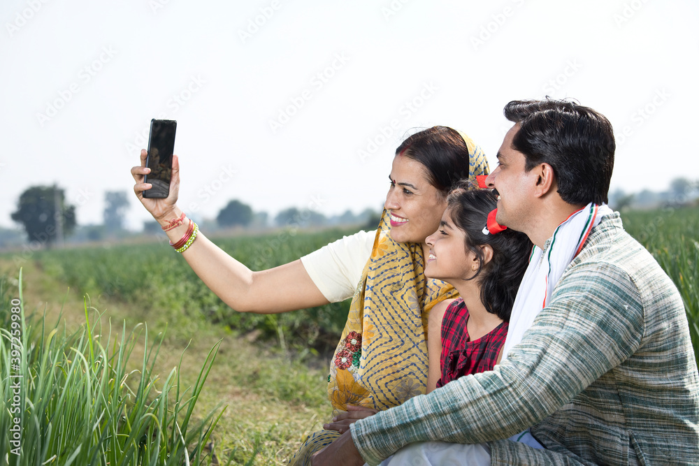 Happy Indian Farmer With Mobile