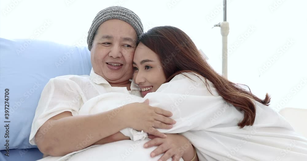 The daughter visited her sick mother with a hug to encourage. Stock ...