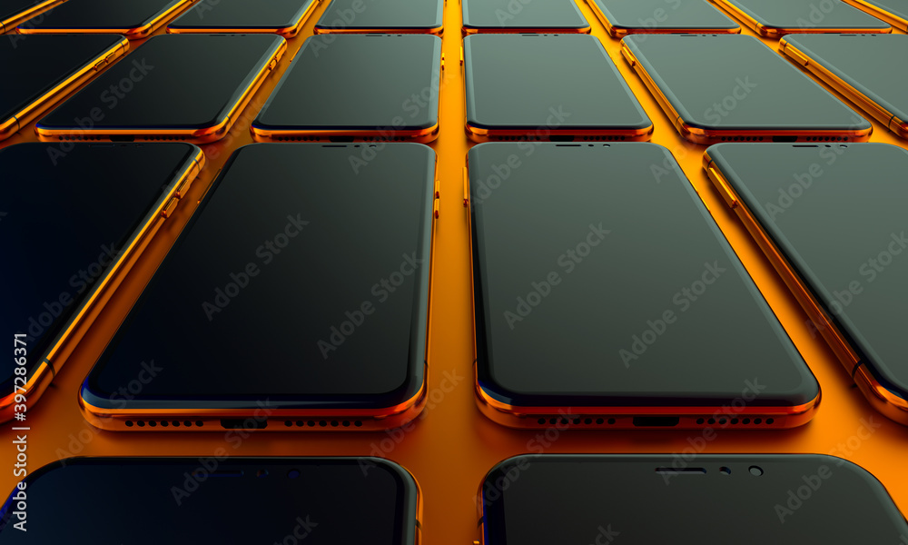 Mobile phones on a gold background. Smartphones on the table ...