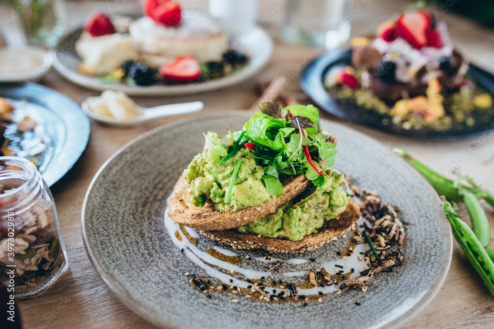 smashed avocado Stock Photo | Adobe Stock