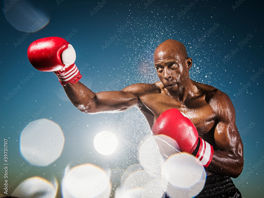Water splashing on black boxer outdoors Stock Photo | Adobe Stock