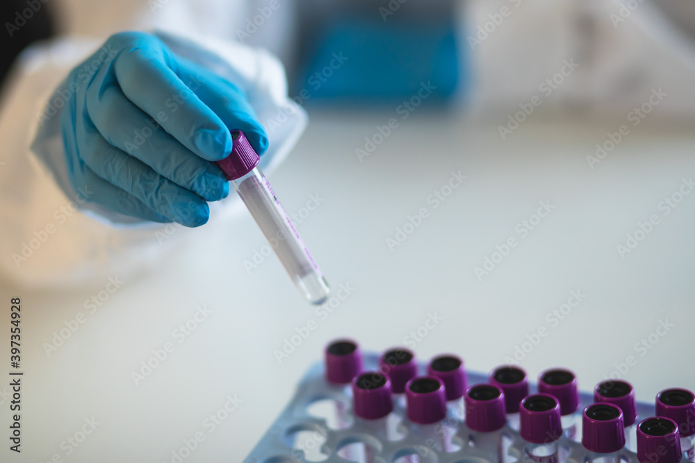 Fotka „Process of coronavirus testing examination by nurse medic in ...