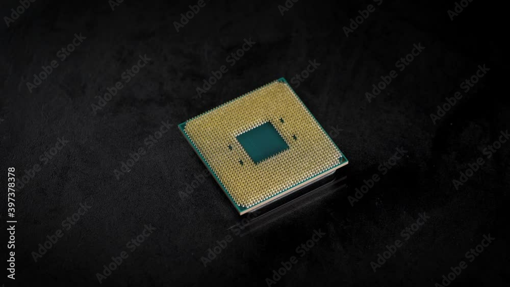 CPU. Studio macro photography of a computer processor. Gold plated ...