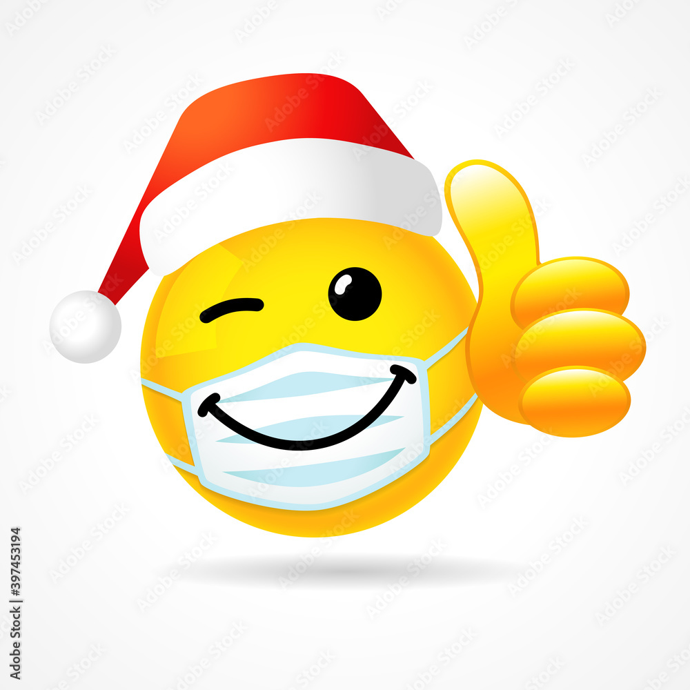 Winking smile in medical mask showing thumb up with Santa hat. Emoji ...