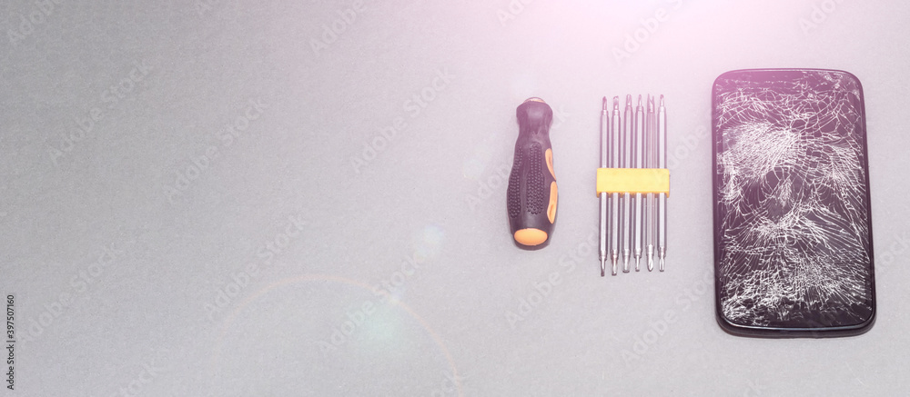 tools for phone repair, touch screen change. mobile phone with broken ...