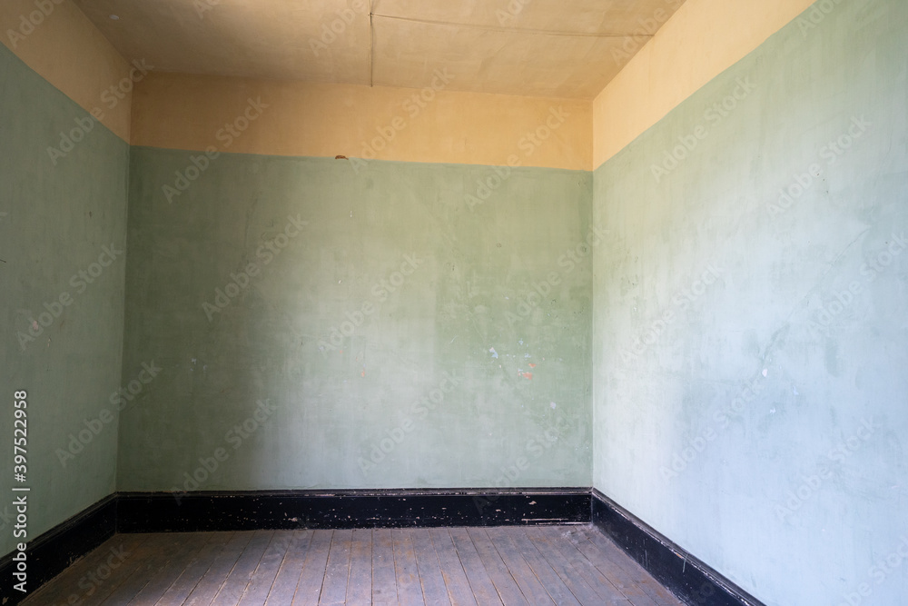 Interior of an empty room in an abandoned building, paint colors of ...