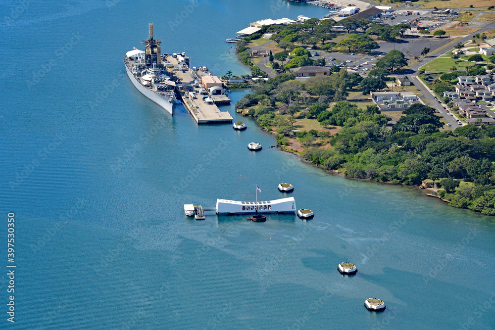 Aerial view of the Arizona memorial with the USS Misssouri in the ...