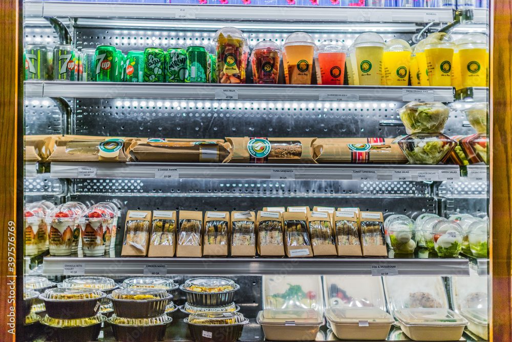 Pre-packaged foods displayed in a commercial refrigerator Stock Photo ...