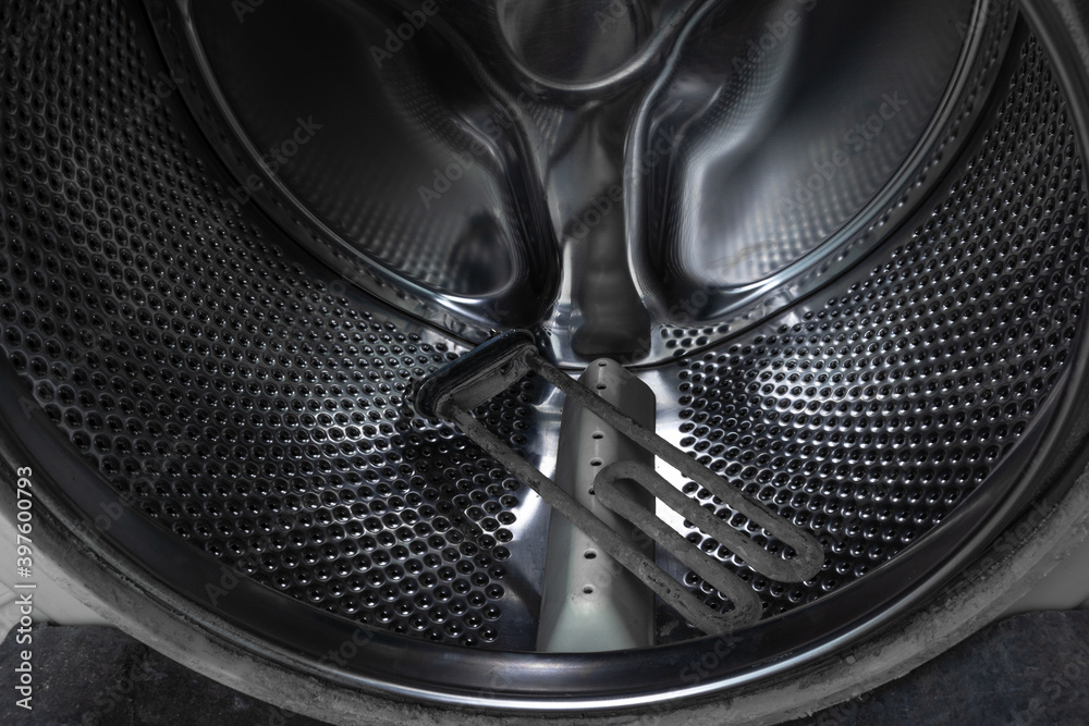 Washing machine repair. Disassembled washing machine with drum and ...