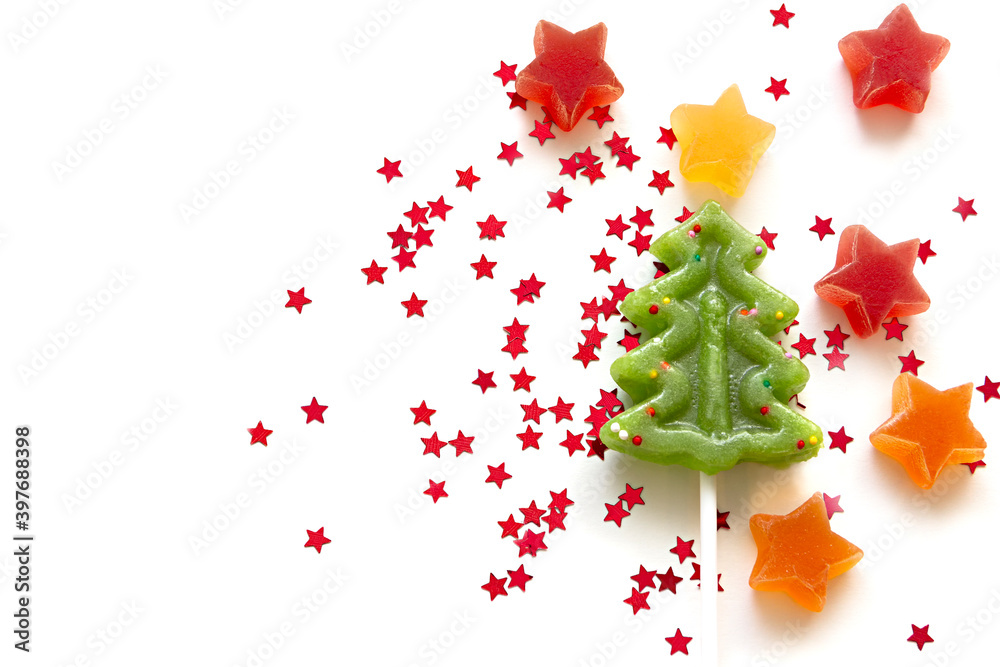 Star shaped fruit jelly, red star shaped confetti and green fir tree ...