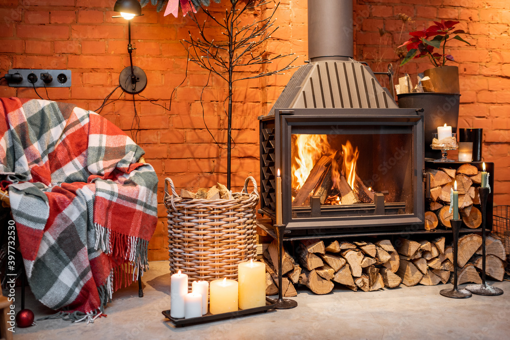 Fireplace area of a beautiful loft-style interior with real brick and ...