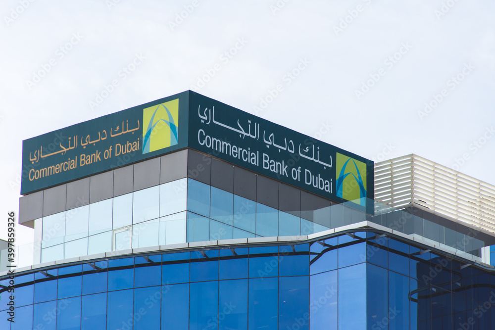 Commercial Bank of Dubai Sign logo on on top of a building on the RAK ...