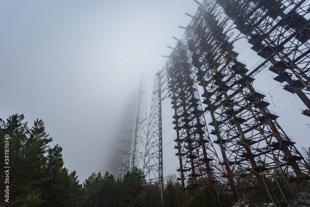 Soviet radar Duga in foggy weather. Russian woodpecker - over-the ...