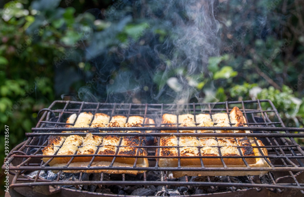 Traditional South African braai broodjies toasted sandwiches prepared ...