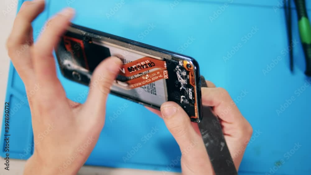 Closeup of mobile device body frame teardown Stock Video | Adobe Stock