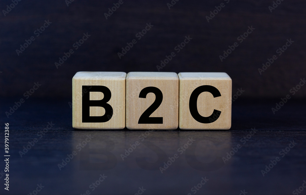 B2C symbol. Concept word 'B2C - business to customer' on cubes on a ...