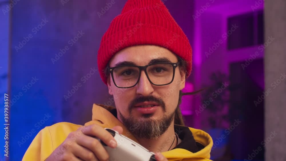 Excited man playing video games on modern console next gen 2020, new ...