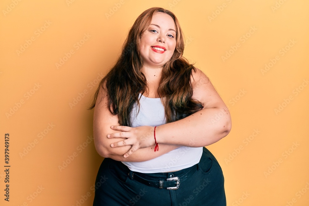 Plus size caucasian young woman wearing casual clothes happy face ...