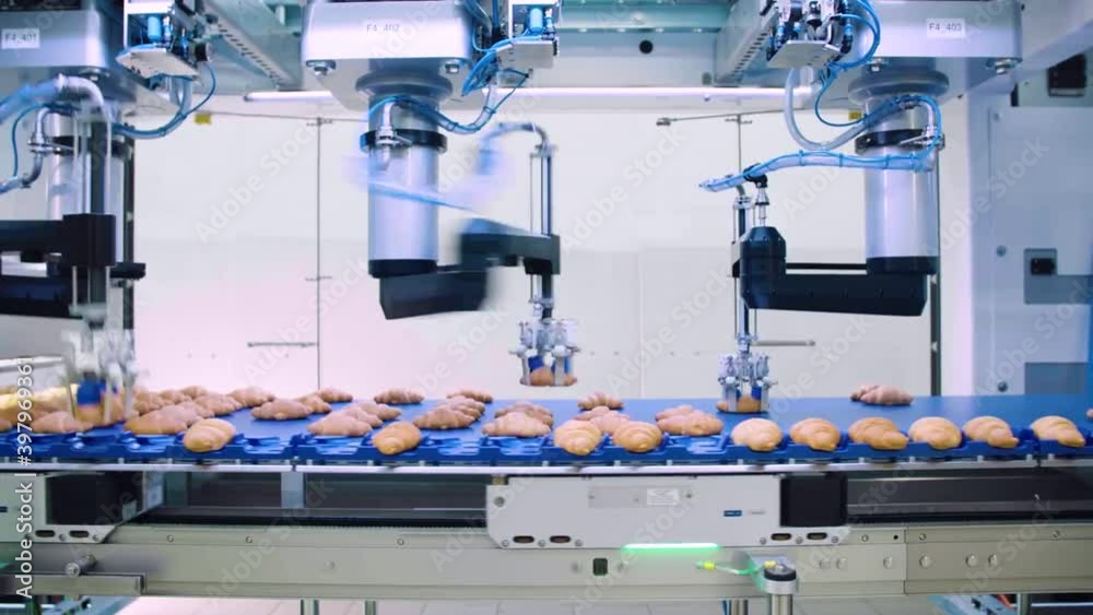 Conveyor line. Bakery plant. Automated machine. Robotic equipment ...