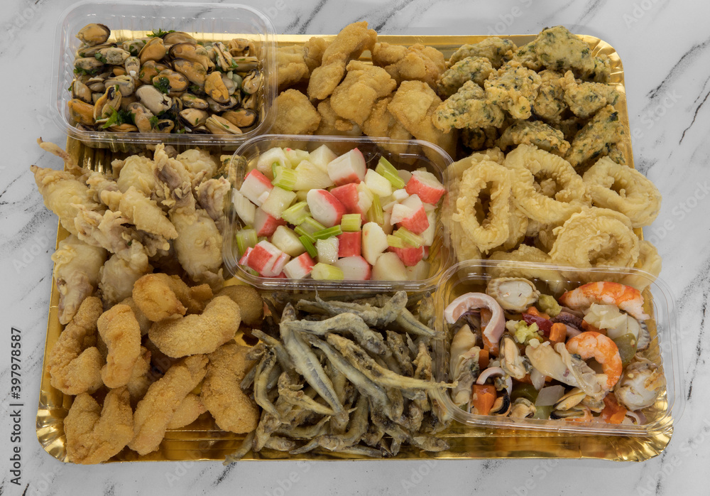 Finger food. Top view of a seafood platter with snacks and nibbles such ...