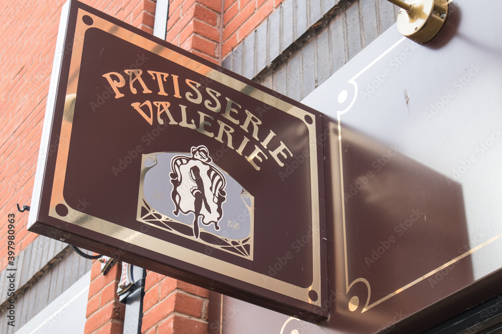 Entrance to Patisserie Valerie Cake store shop showing logo, sign ...
