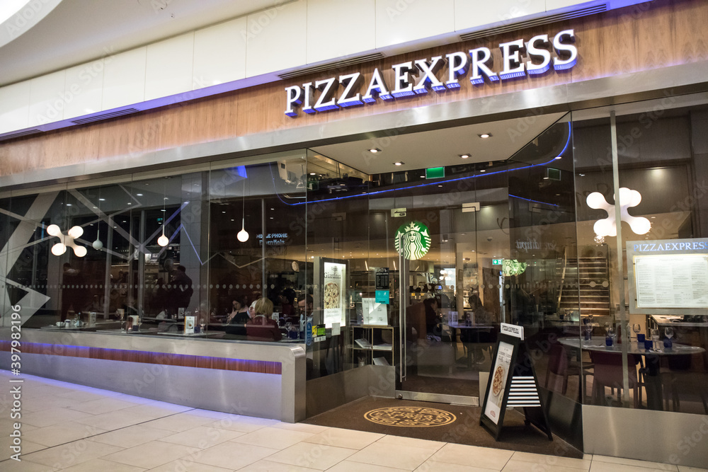 Entrance to Pizza Express inside shopping mall showing signage, logo ...