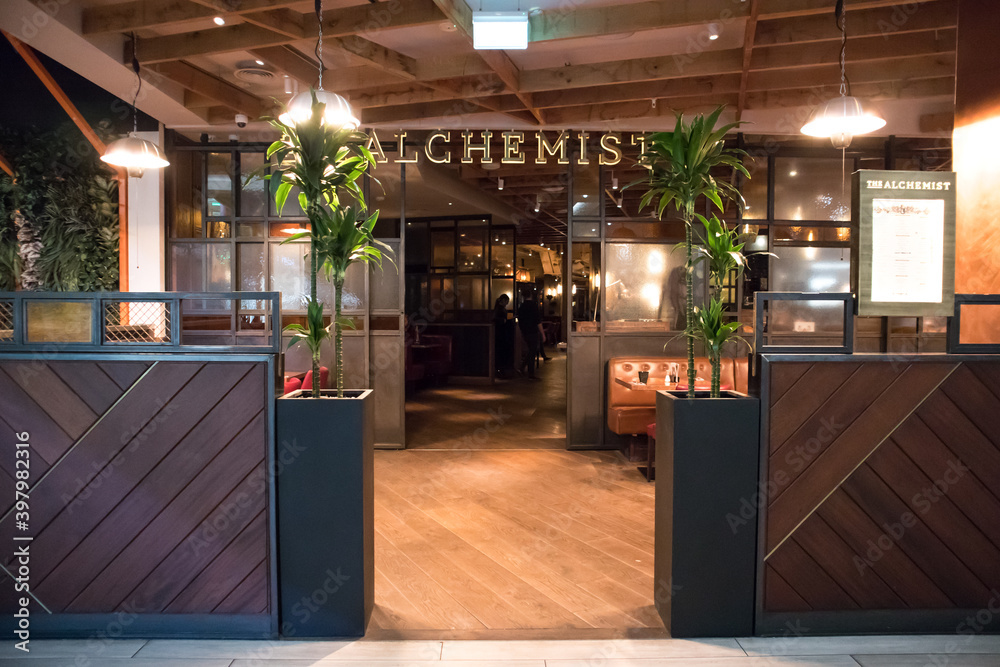 Entrance to The Alchemist inside shopping mall showing signage, logo ...