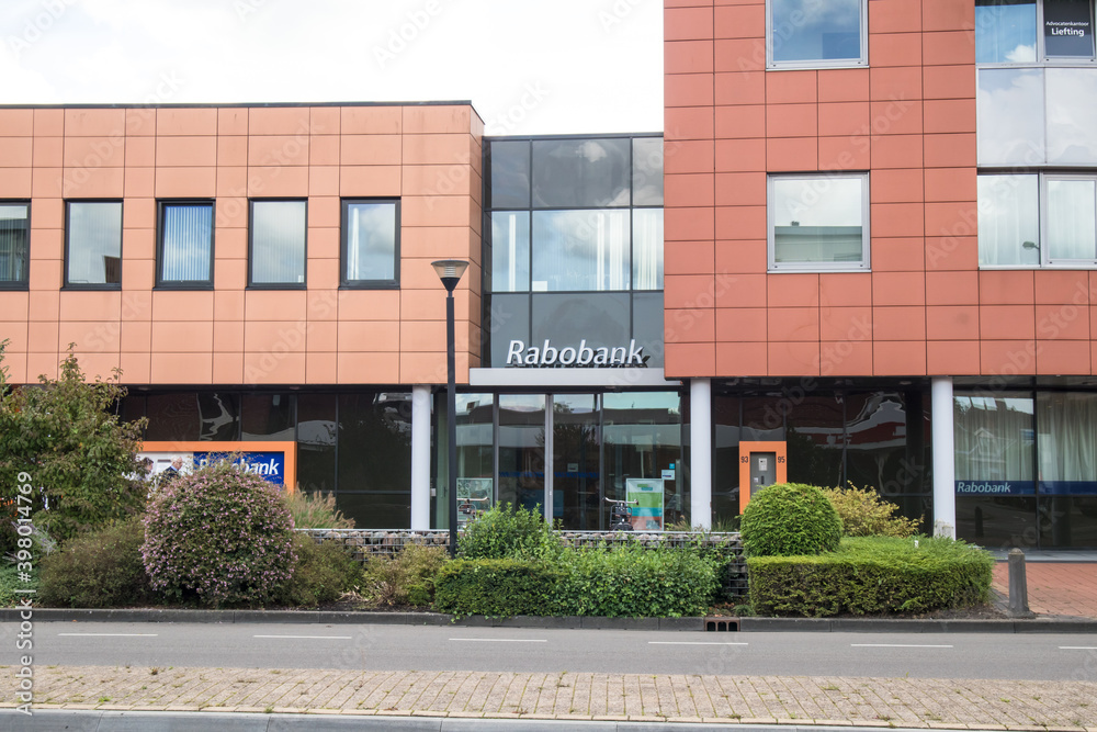 Rabobank building branch entrance with sign, logo, signage on the ... Rabobank building branch entrance with sign, logo, signage on the ...