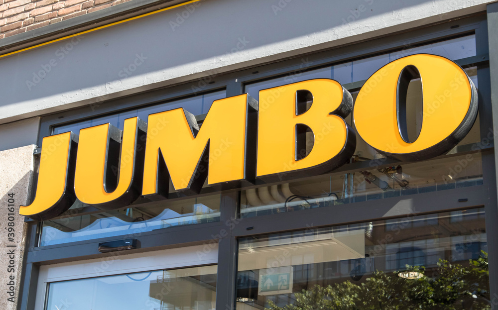 Yellow Jumbo grocery shop sign on outside facade of building Stock ...