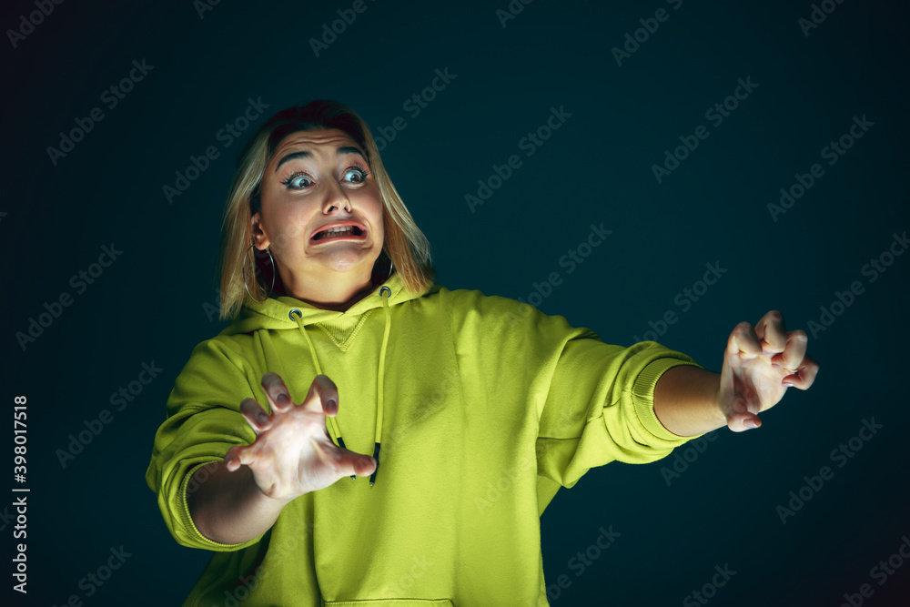 Trying to run. Portrait of young crazy scared and shocked caucasian ...