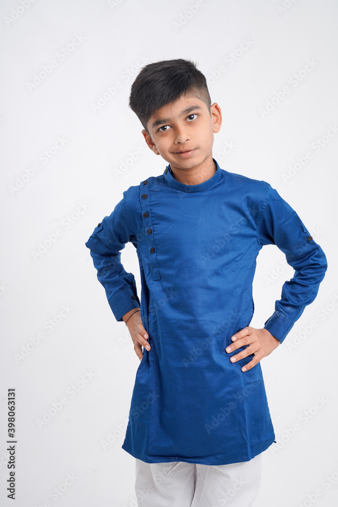 Cute indian little boy in ethnic wear and showing expression over white ...