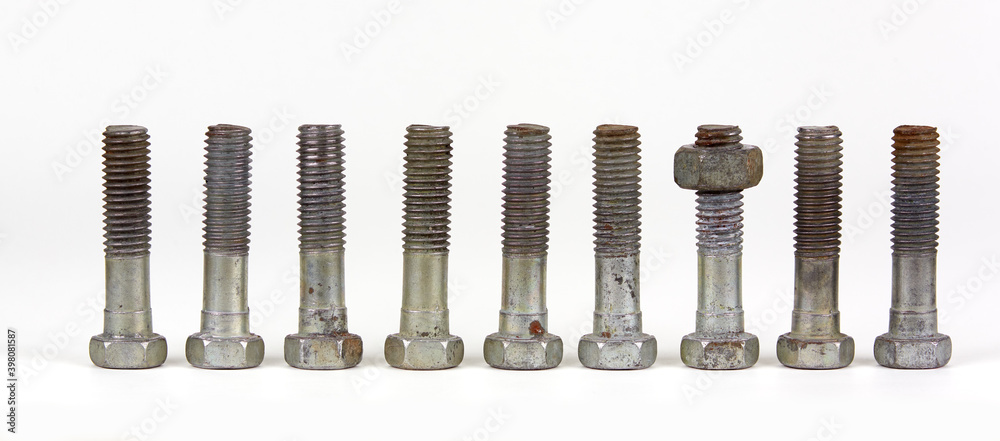 Conceptual plot with nine bolts with nuts in a row on white background ...