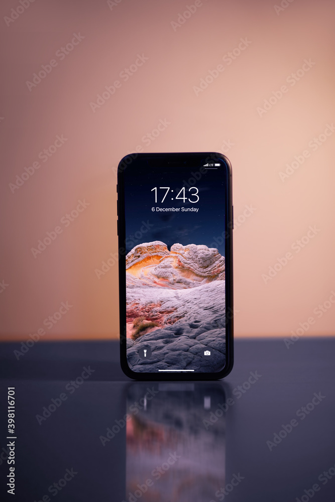 Standing tall on the desk, iPhone 11 Black with a screen on and new ...