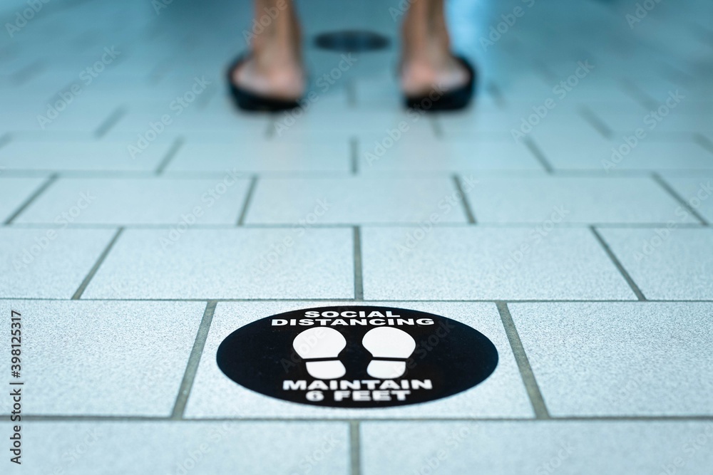 People standing 6 feet apart in a public area. Social distancing, Covid ...