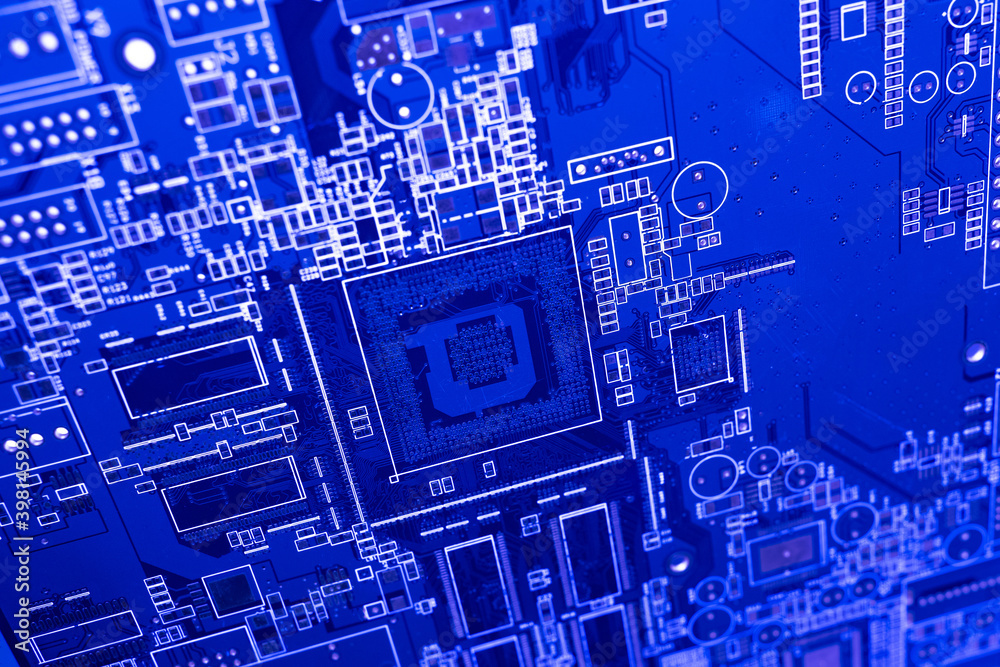 PCB background. PCB in blue neon light. Microchip close-up. PCB ...