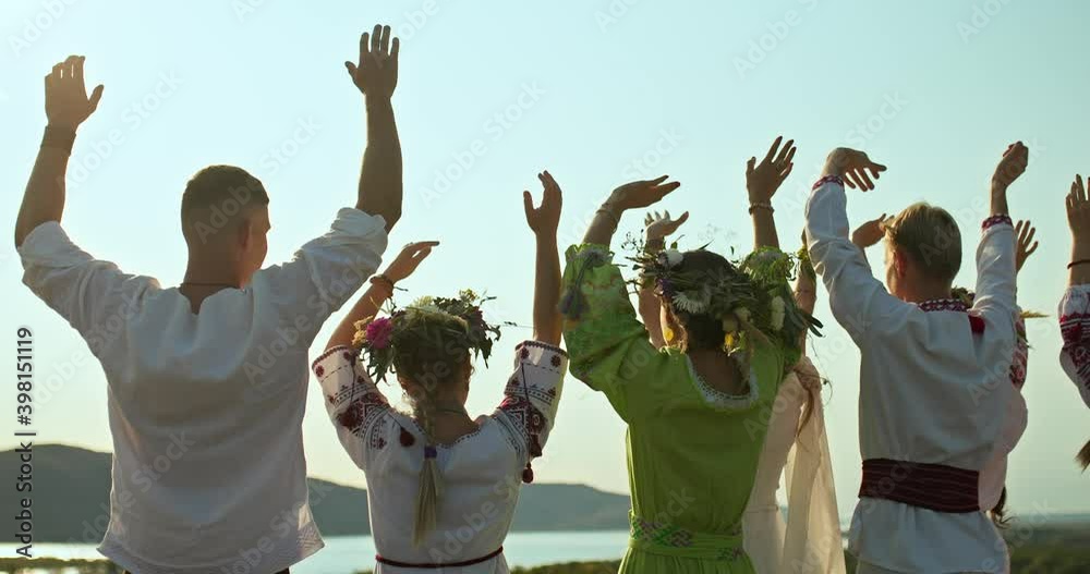 Close-up, Slavic people are in national costumes, dresses and wreaths ...