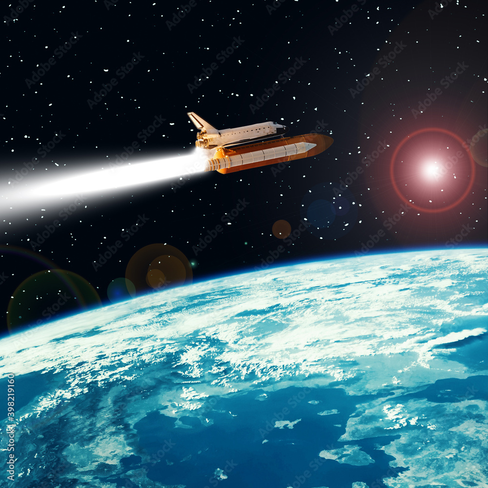 Sunflare and rocket. The elements of this image furnished by NASA ...